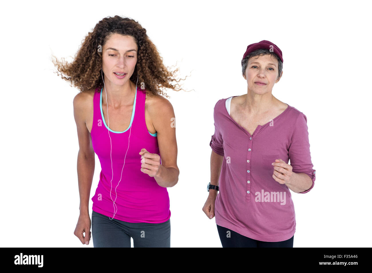 Determined women jogging Stock Photo - Alamy