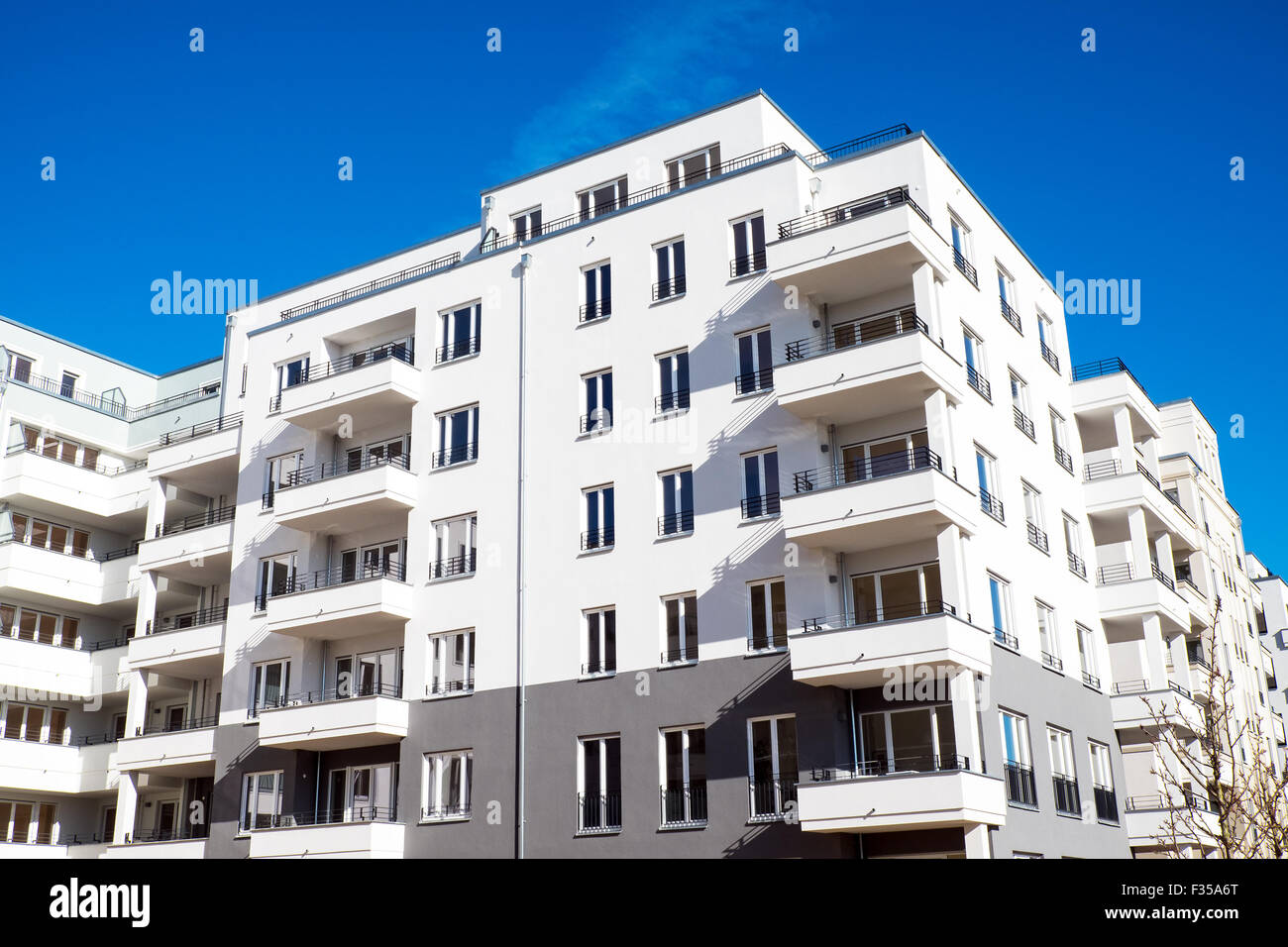 A white modern housing complex seen in Berlin Stock Photo - Alamy