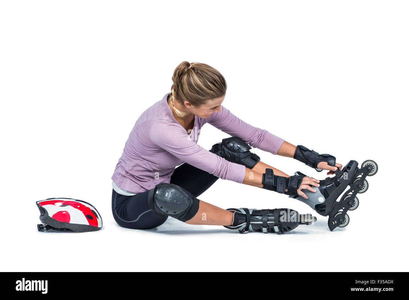 Woman wearing inline skates Stock Photo - Alamy