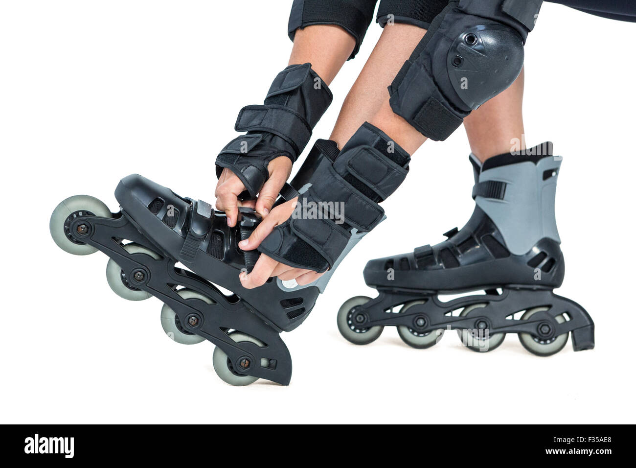 Woman wearing inline skates Stock Photo - Alamy