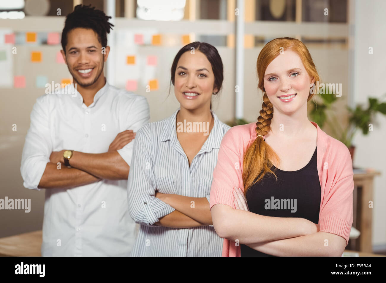Arms crossed corporate teamwork hi-res stock photography and images - Alamy
