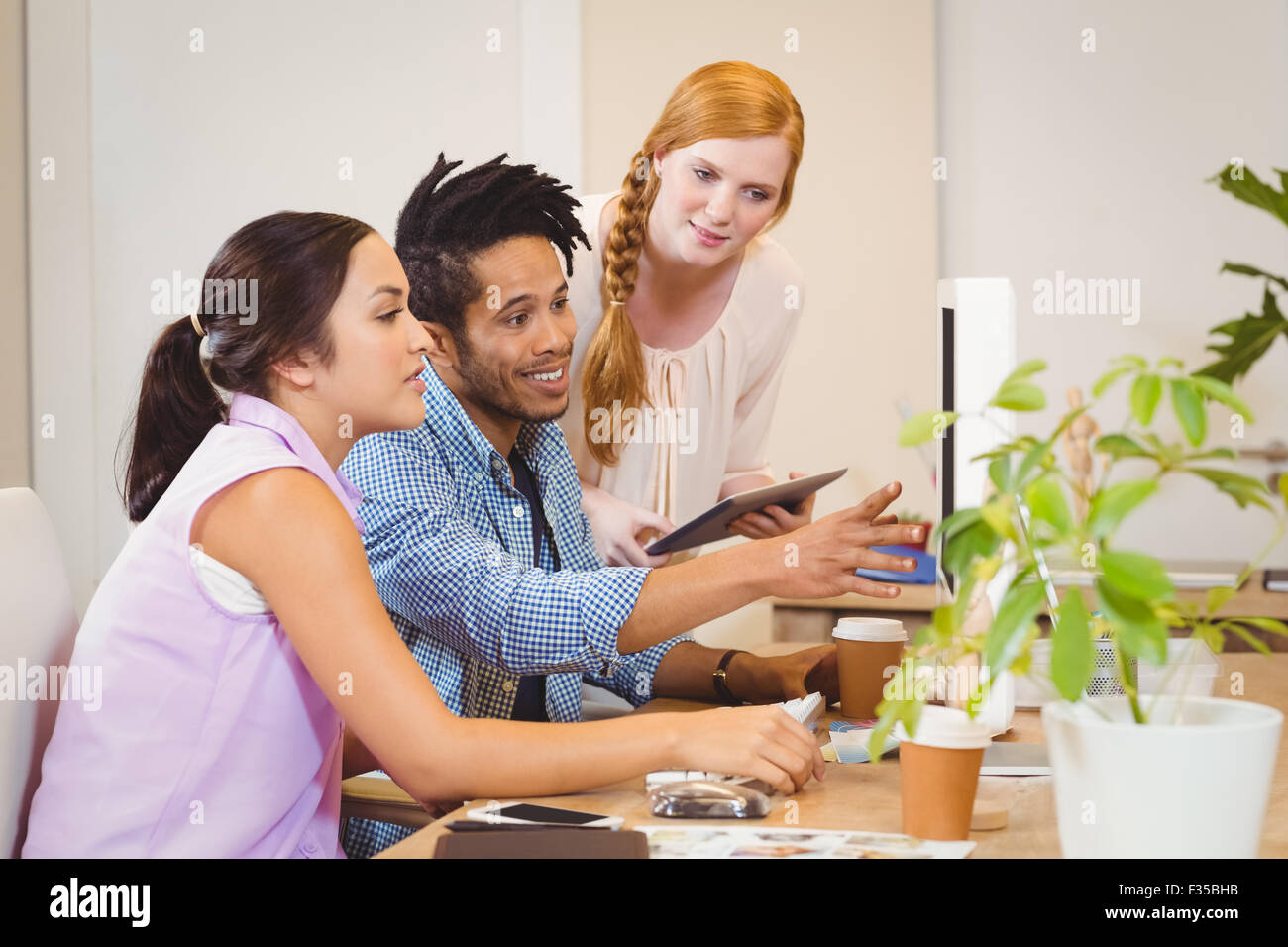 Business people working together Stock Photo - Alamy