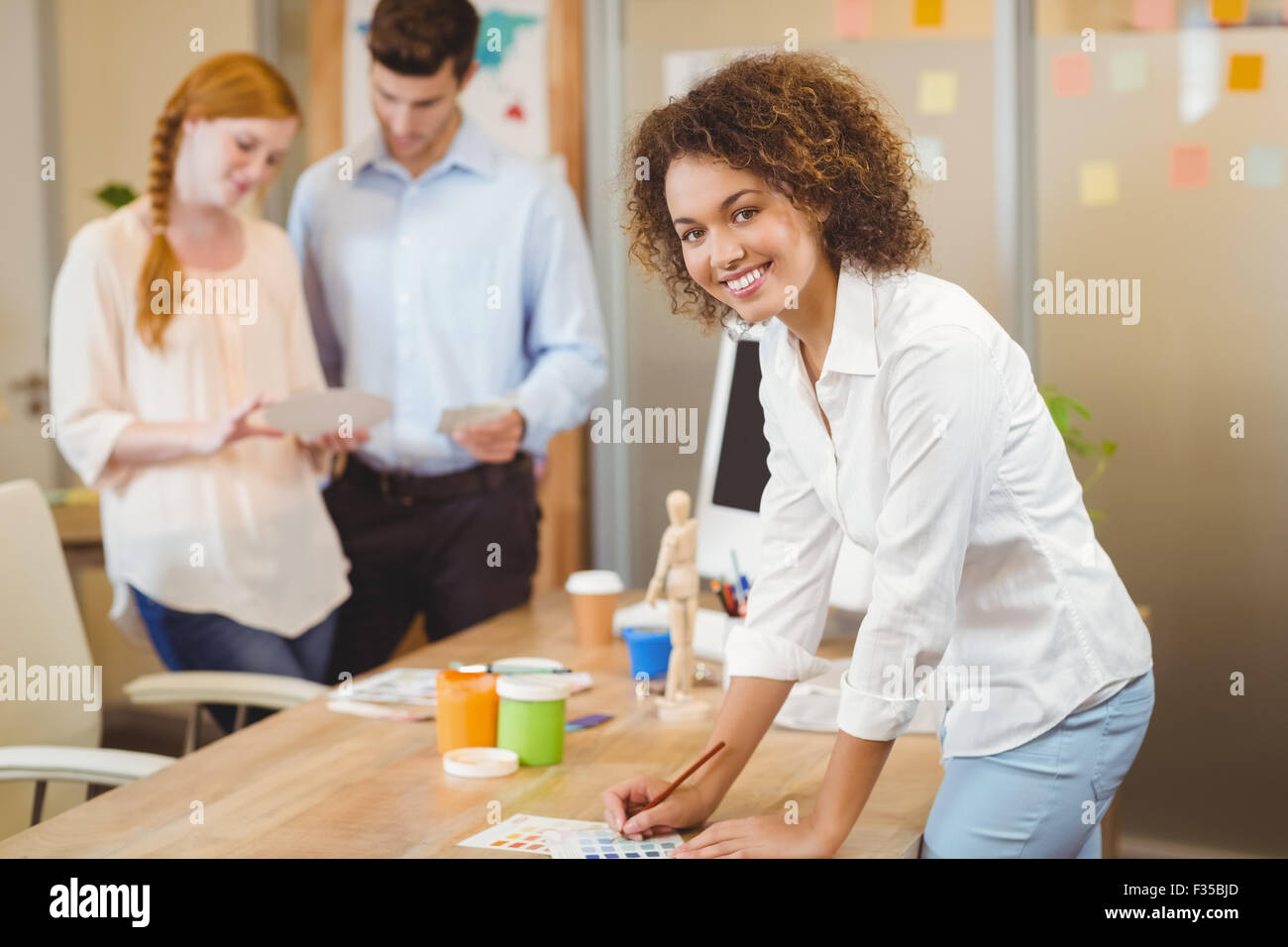 Businesswoman standing table hi-res stock photography and images - Alamy