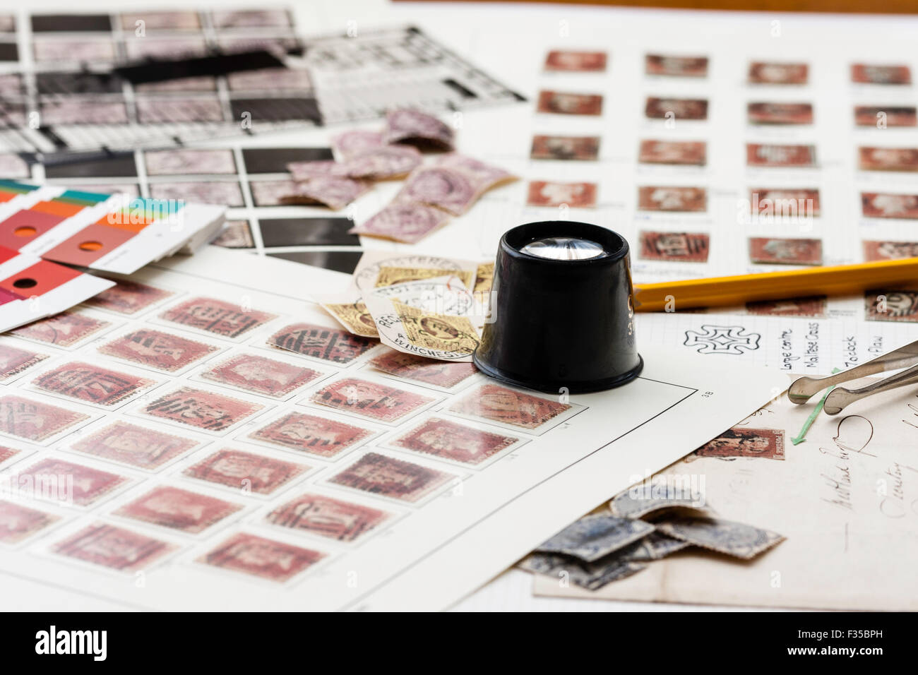 Philately, stamp collecting. Album sheets of Victorian Penny Red stamps ...