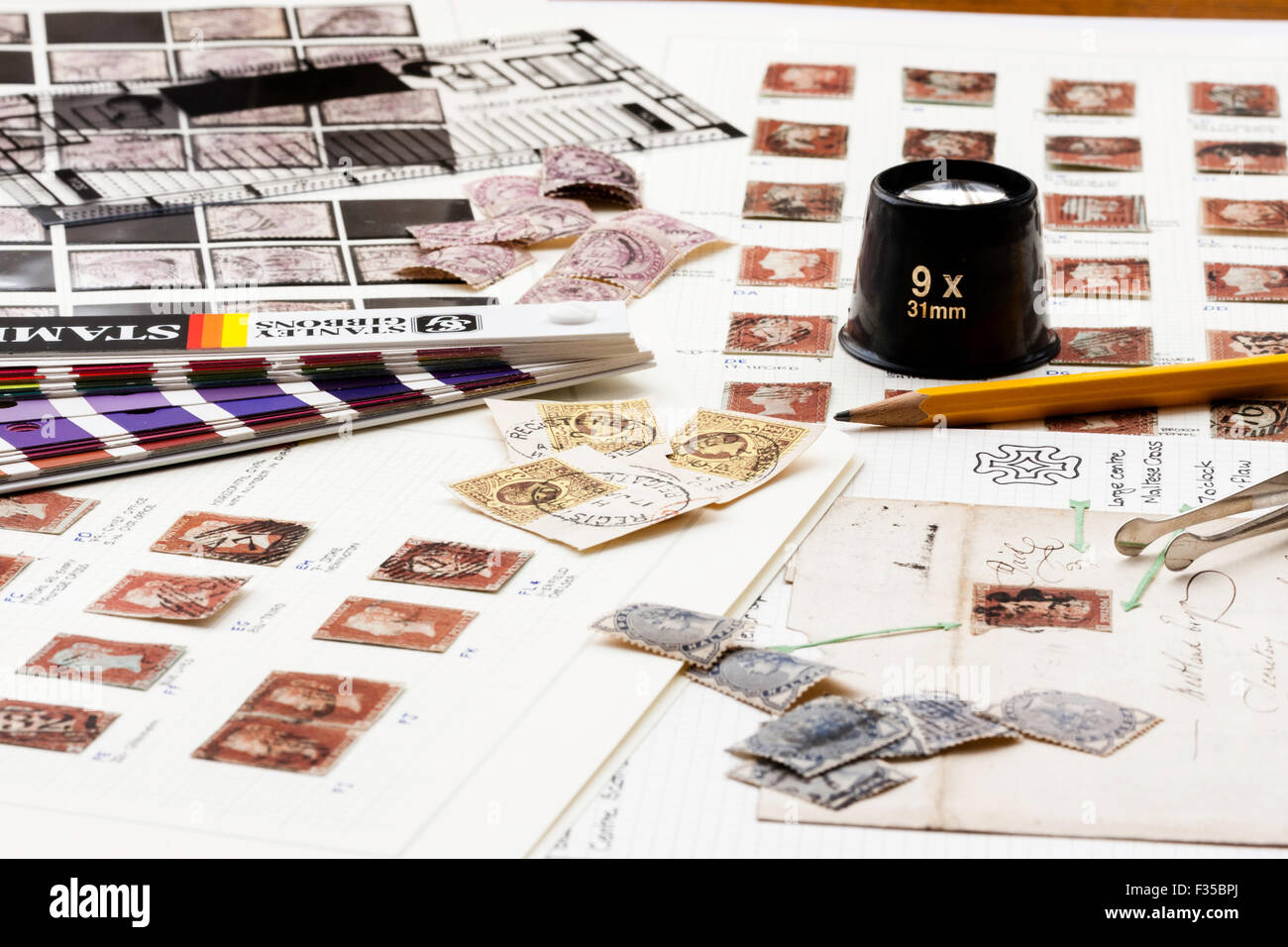 Philately, stamp collecting. Album sheets of Victorian Penny Red stamps ...