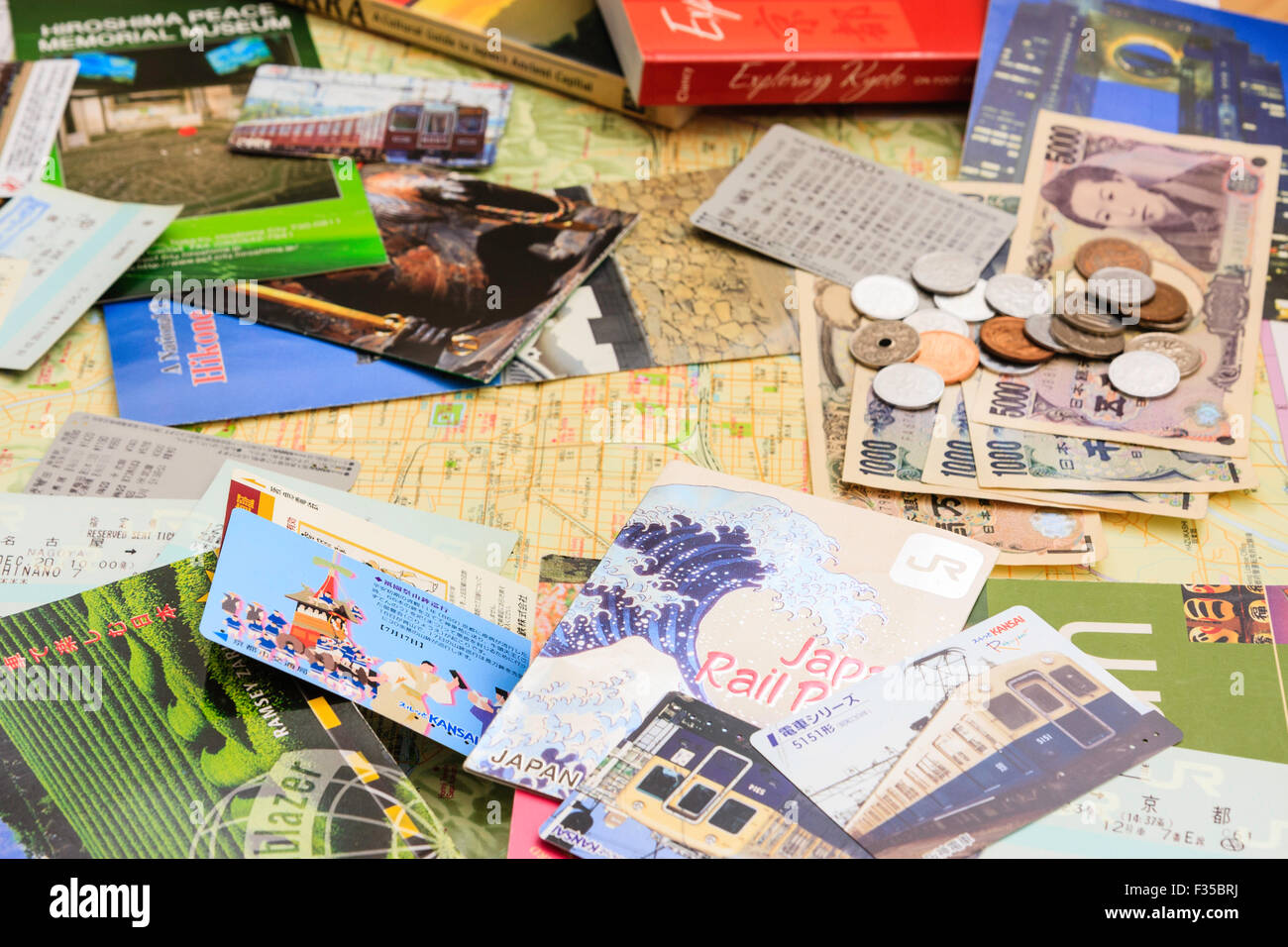 Japanese travel section. Maps, guide books, leaflets, money, Japan Rail ...