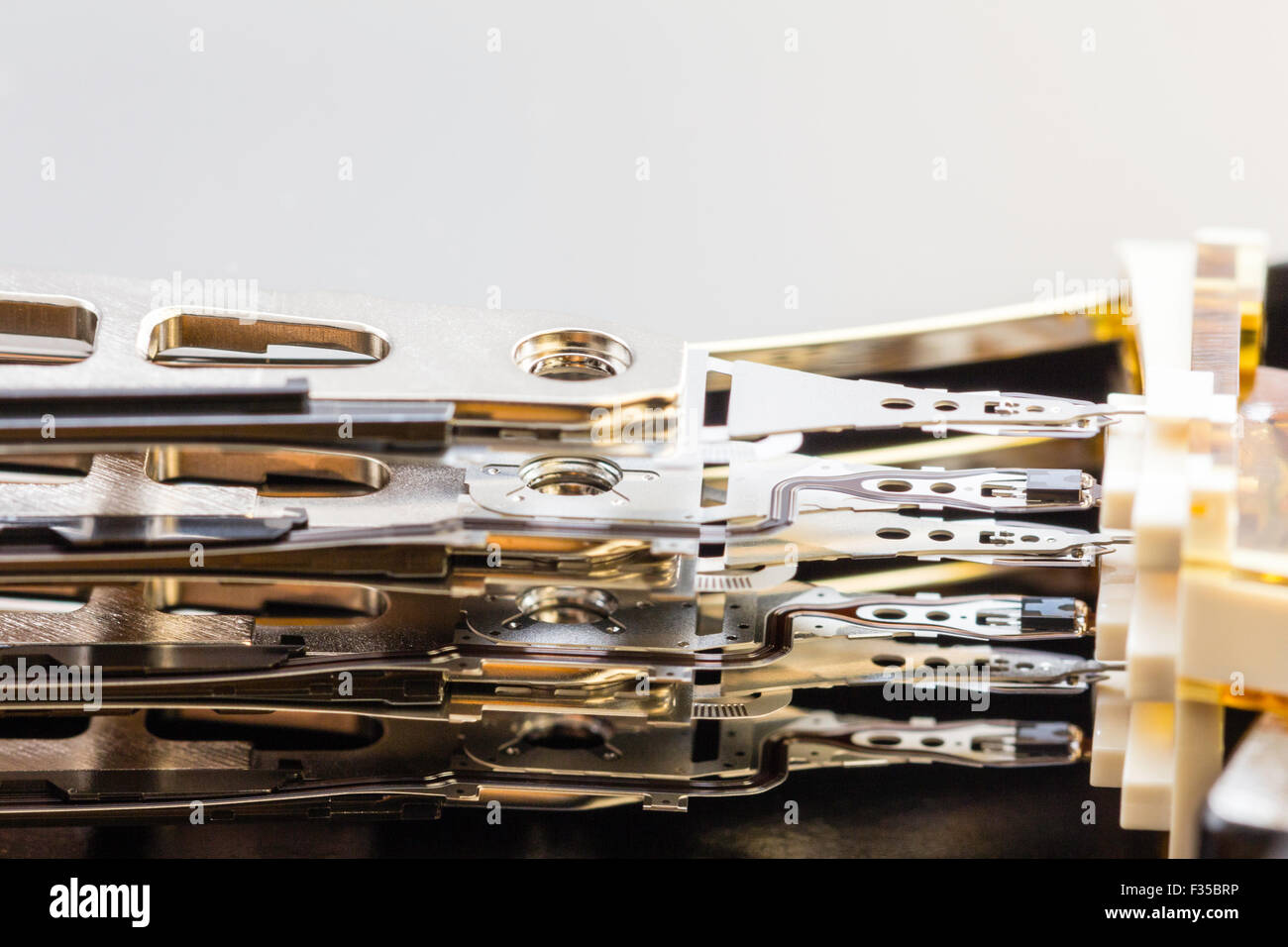 Computer hard disc drive, inside showing the three actuator arms that ...