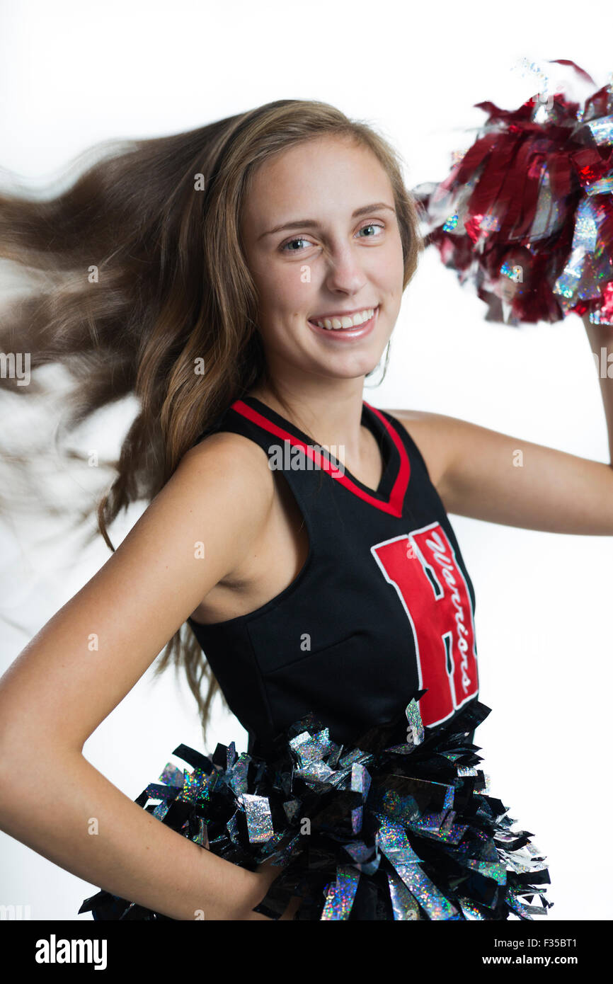 Smiling Caucasian teenaged girl with blue eyes and long brown hair in a ...