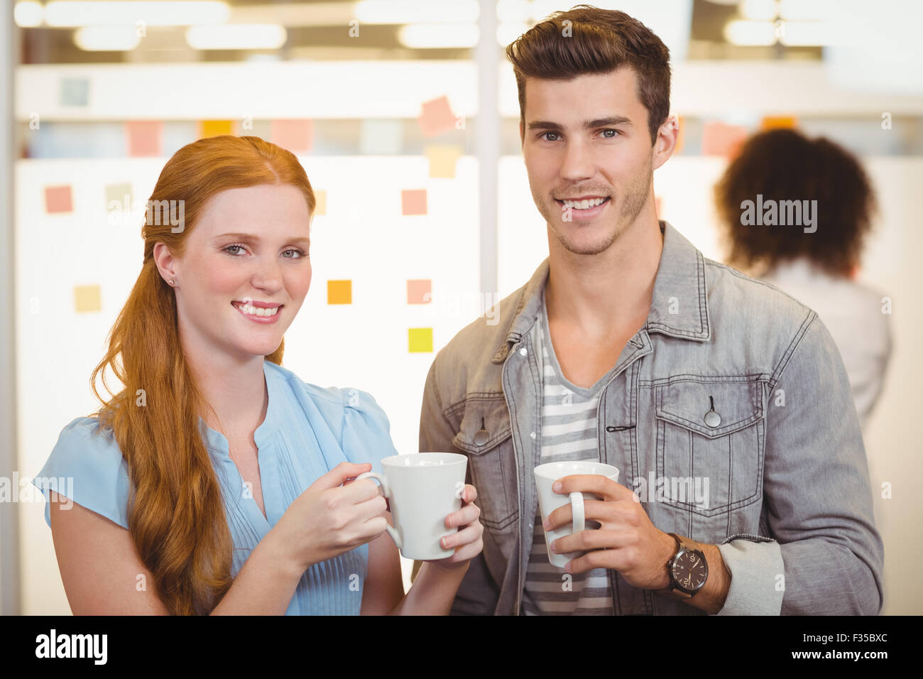 Portrait of business people having coffee break Stock Photo - Alamy