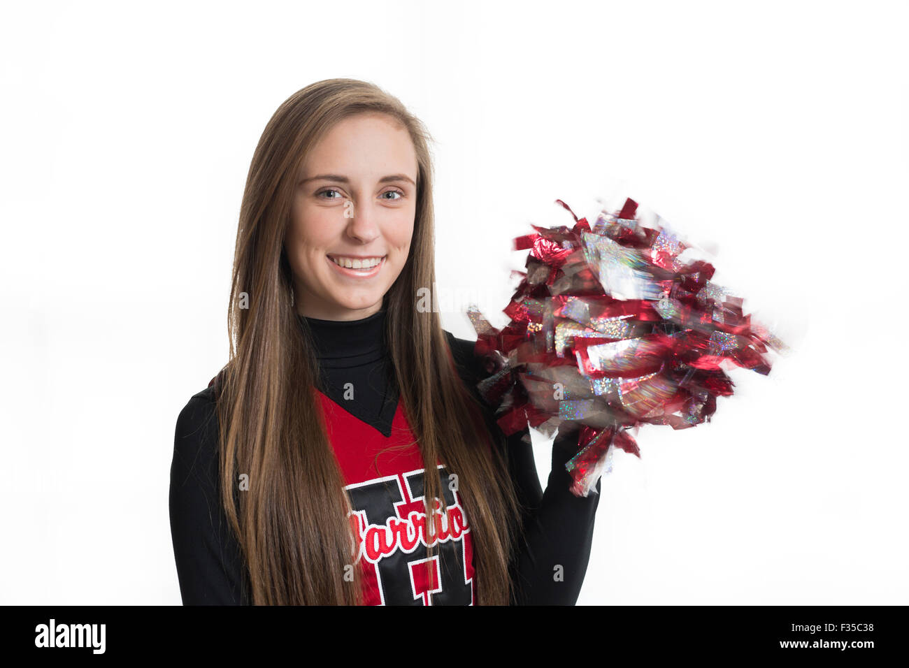 Smiling Caucasian teenaged girl with blue eyes and long brown hair in a ...