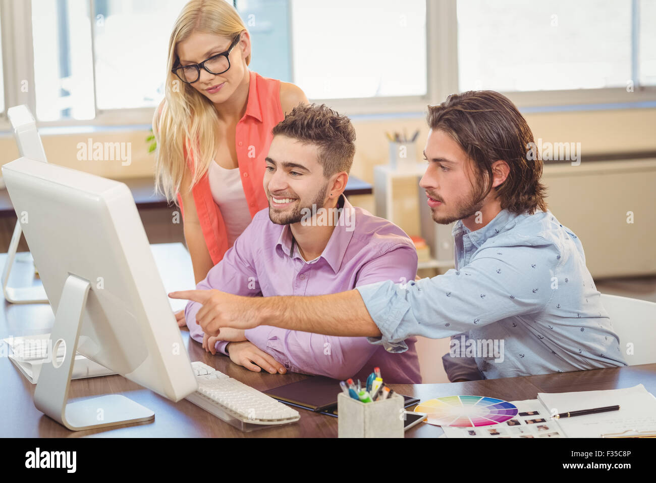 Businessman holding document pointing on hi-res stock photography and ...