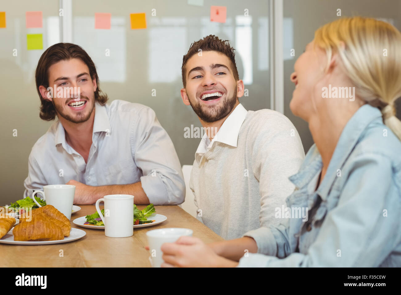 Businessman laughing during lunch hi-res stock photography and images ...