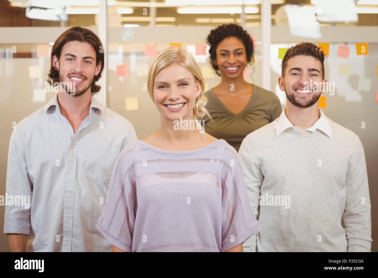 Portrait of smiling colleagues in creative office Stock Photo - Alamy