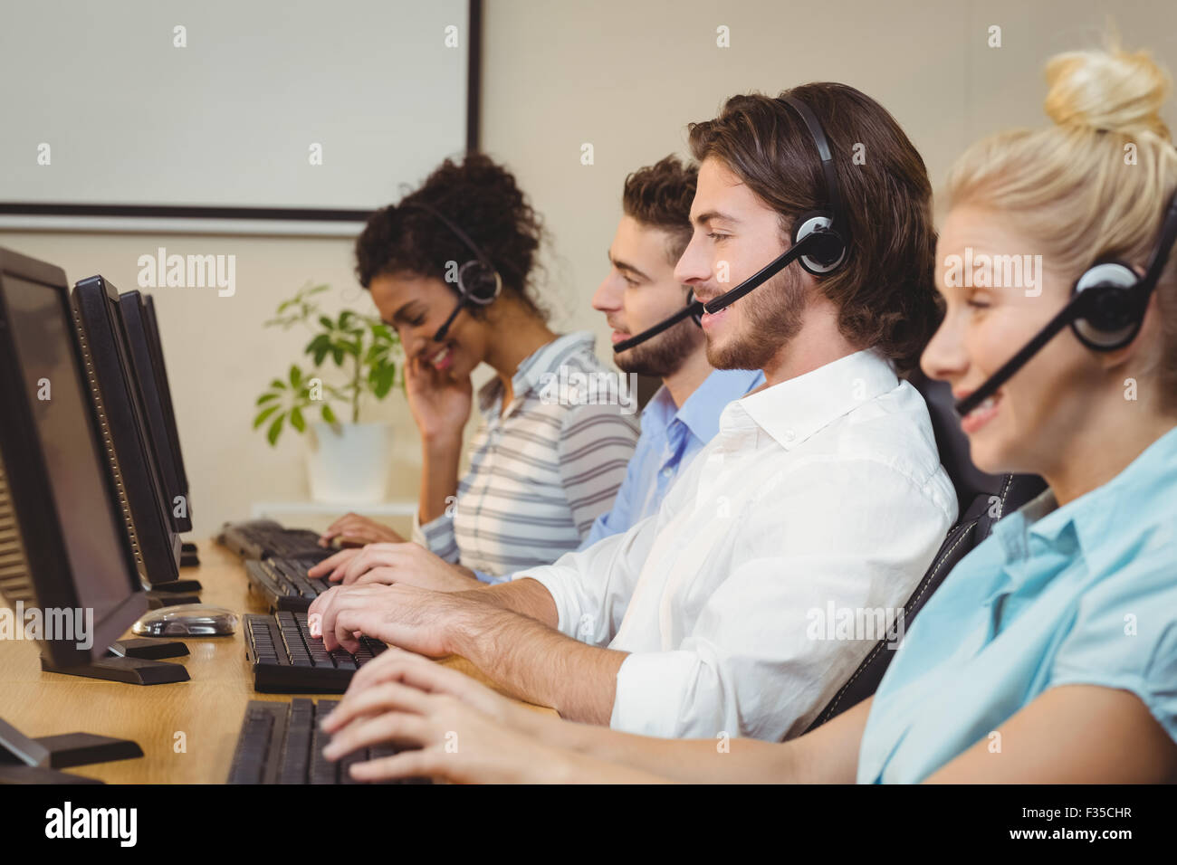 Working in call center hi-res stock photography and images - Alamy
