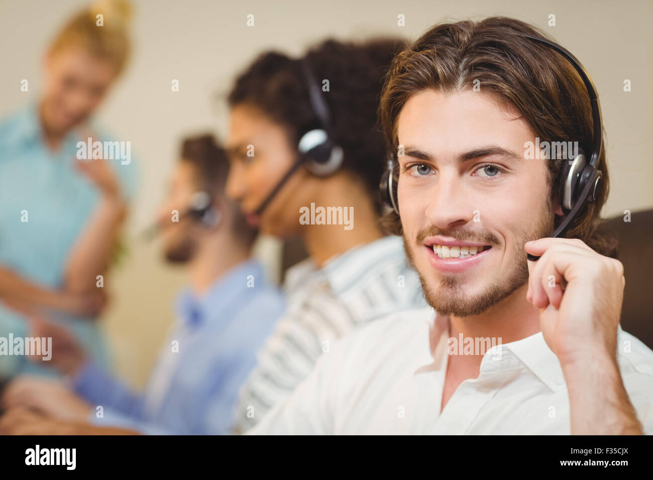 Call center male employee hi-res stock photography and images - Alamy