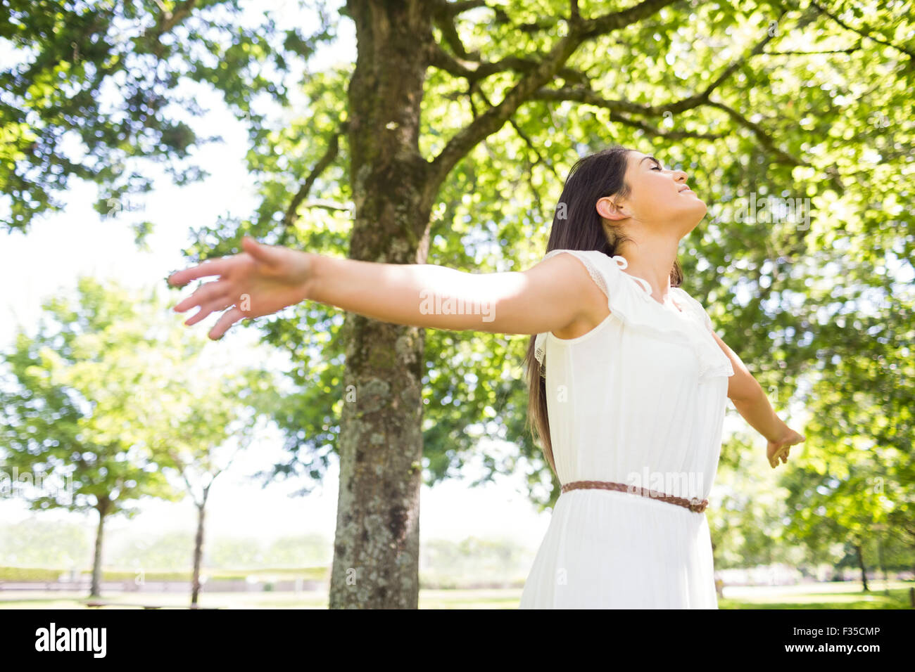 Beautiful woman with arms outstretched Stock Photo - Alamy