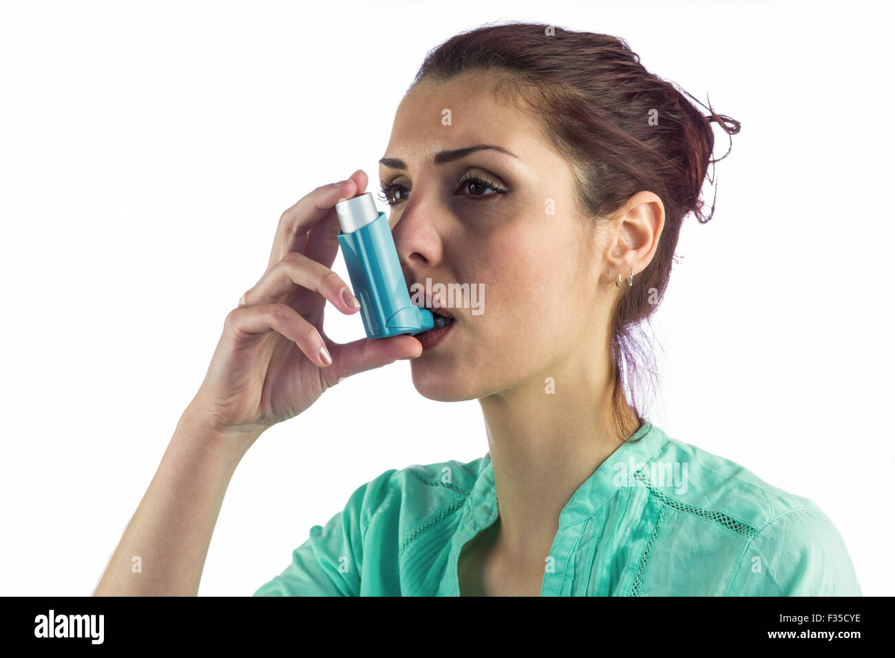 Close-up of woman using asthma inhaler Stock Photo - Alamy
