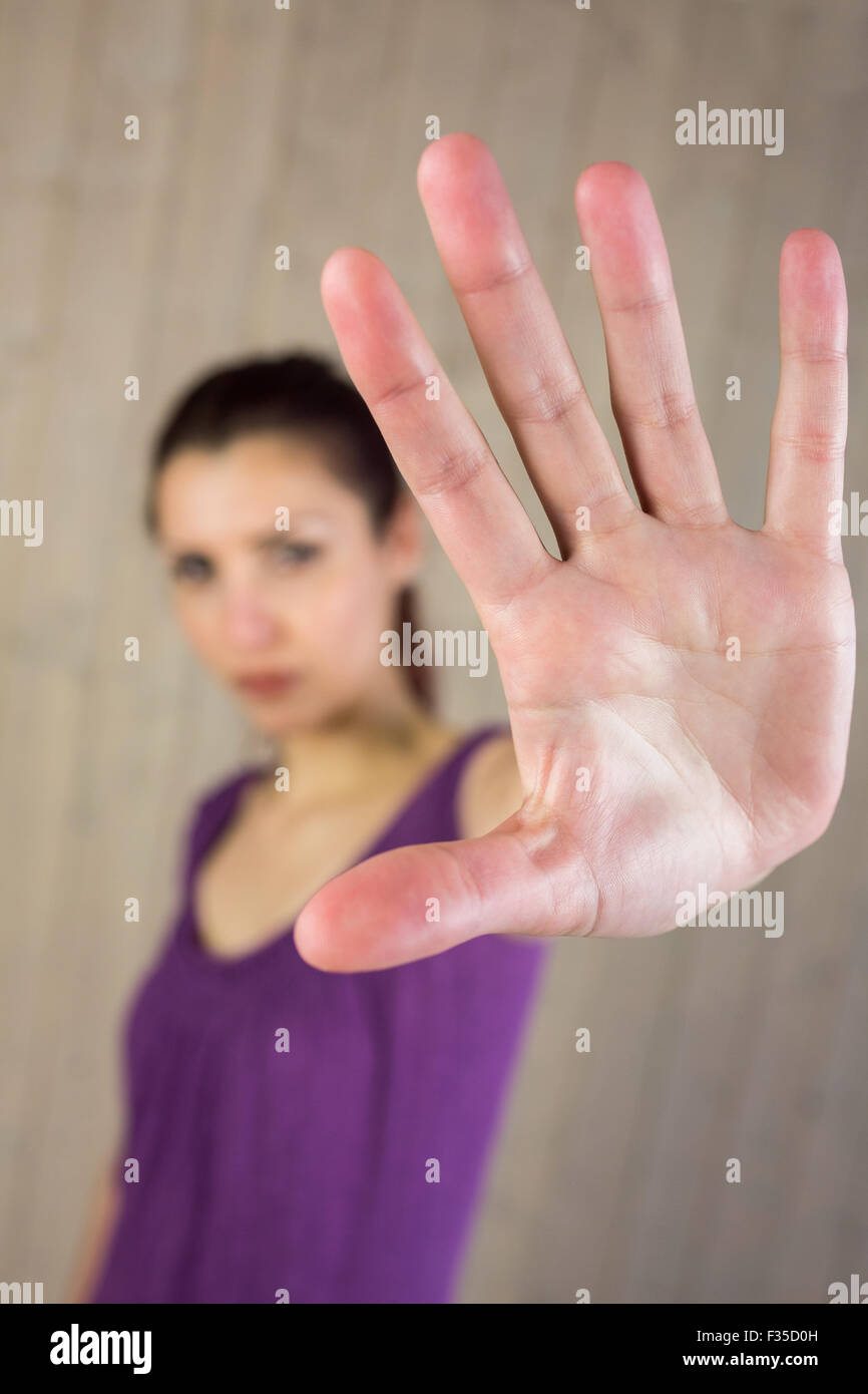Portrait of serious woman with stop sign Stock Photo - Alamy