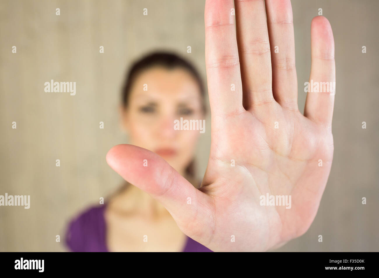 Woman showing stop sign Stock Photo - Alamy