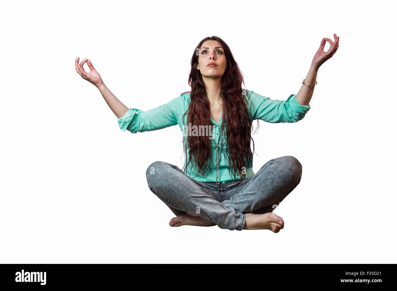 Full length of beautiful woman levitating Stock Photo - Alamy