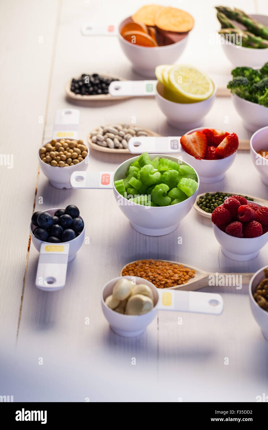 Portion cups of healthy ingredients Stock Photo - Alamy