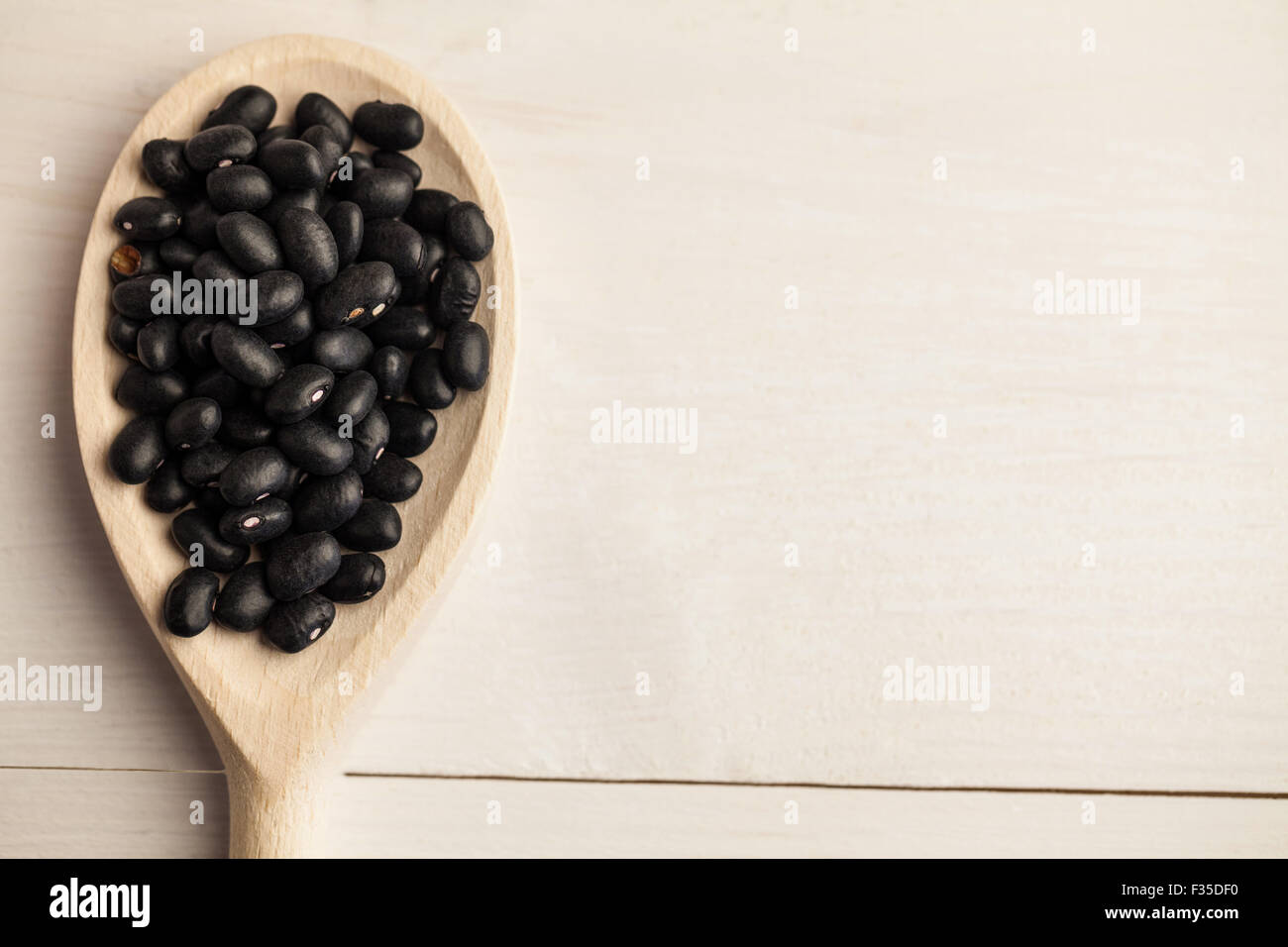 Spoon black beans hi-res stock photography and images - Alamy