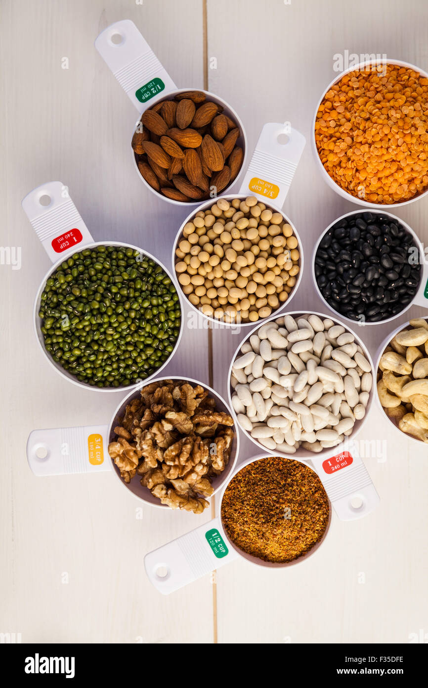 Portion cups of healthy ingredients Stock Photo - Alamy