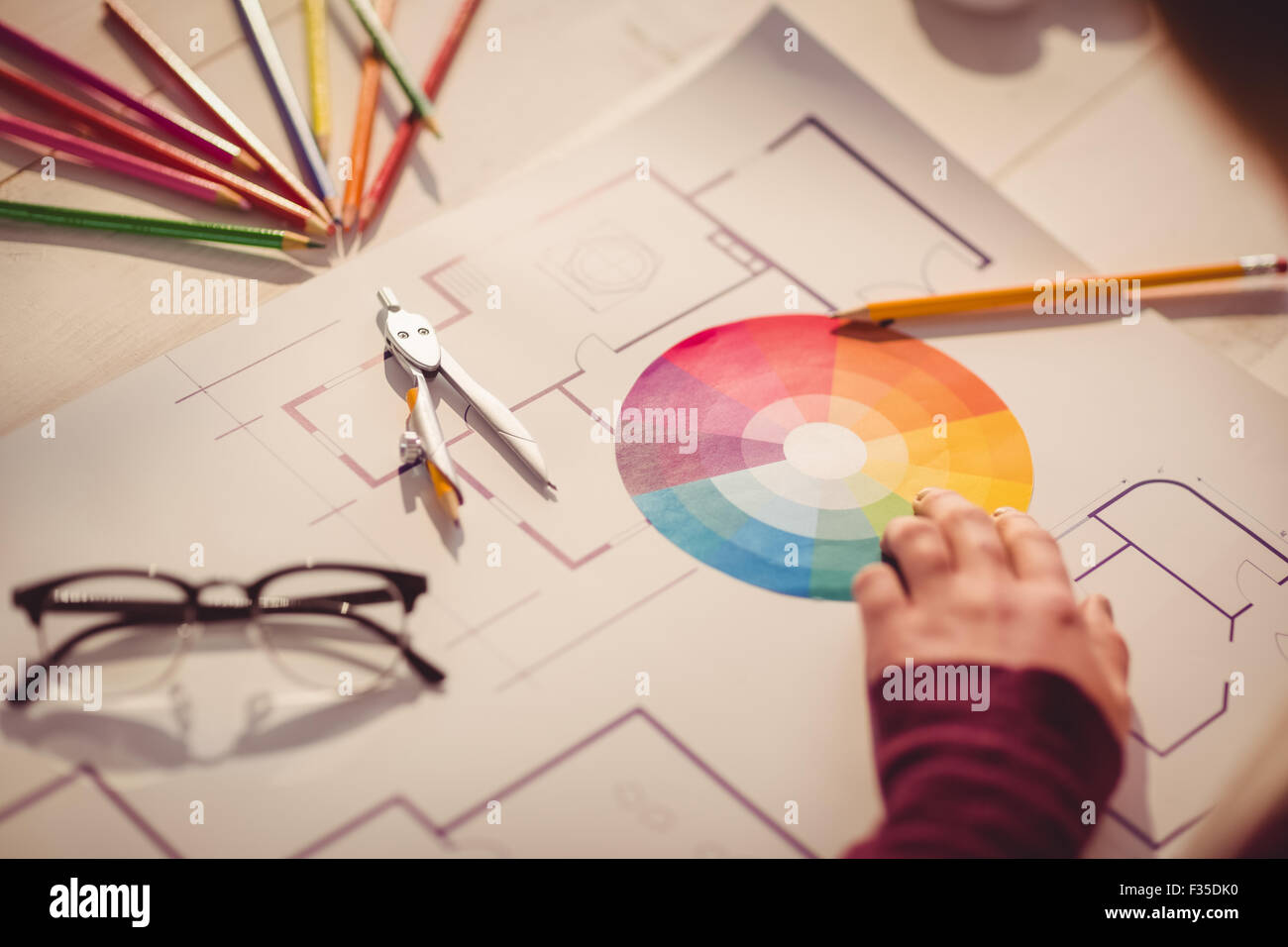 Graphic designer working at desk Stock Photo - Alamy
