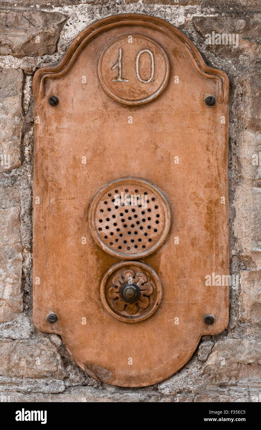 Front view of an old intercom located in a brick wall Stock Photo - Alamy
