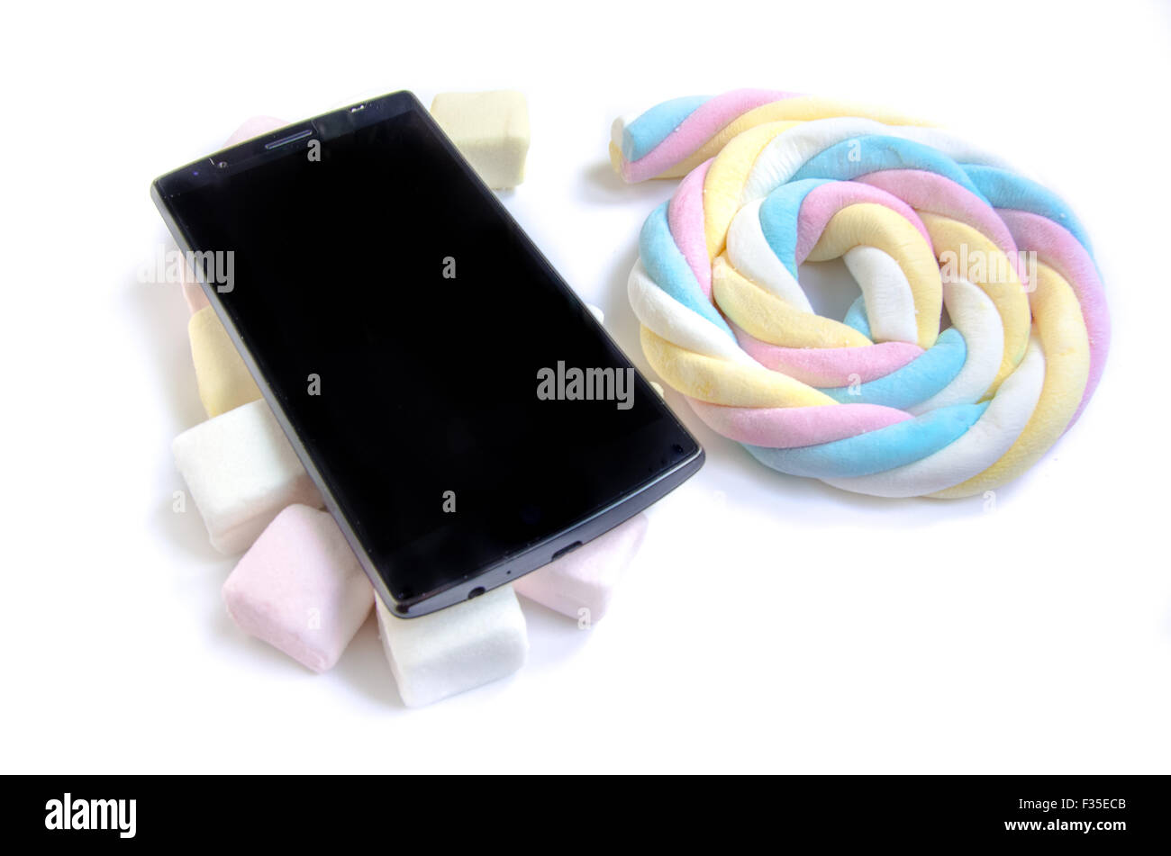 Mobile phone with colored marshmallows candies Stock Photo - Alamy