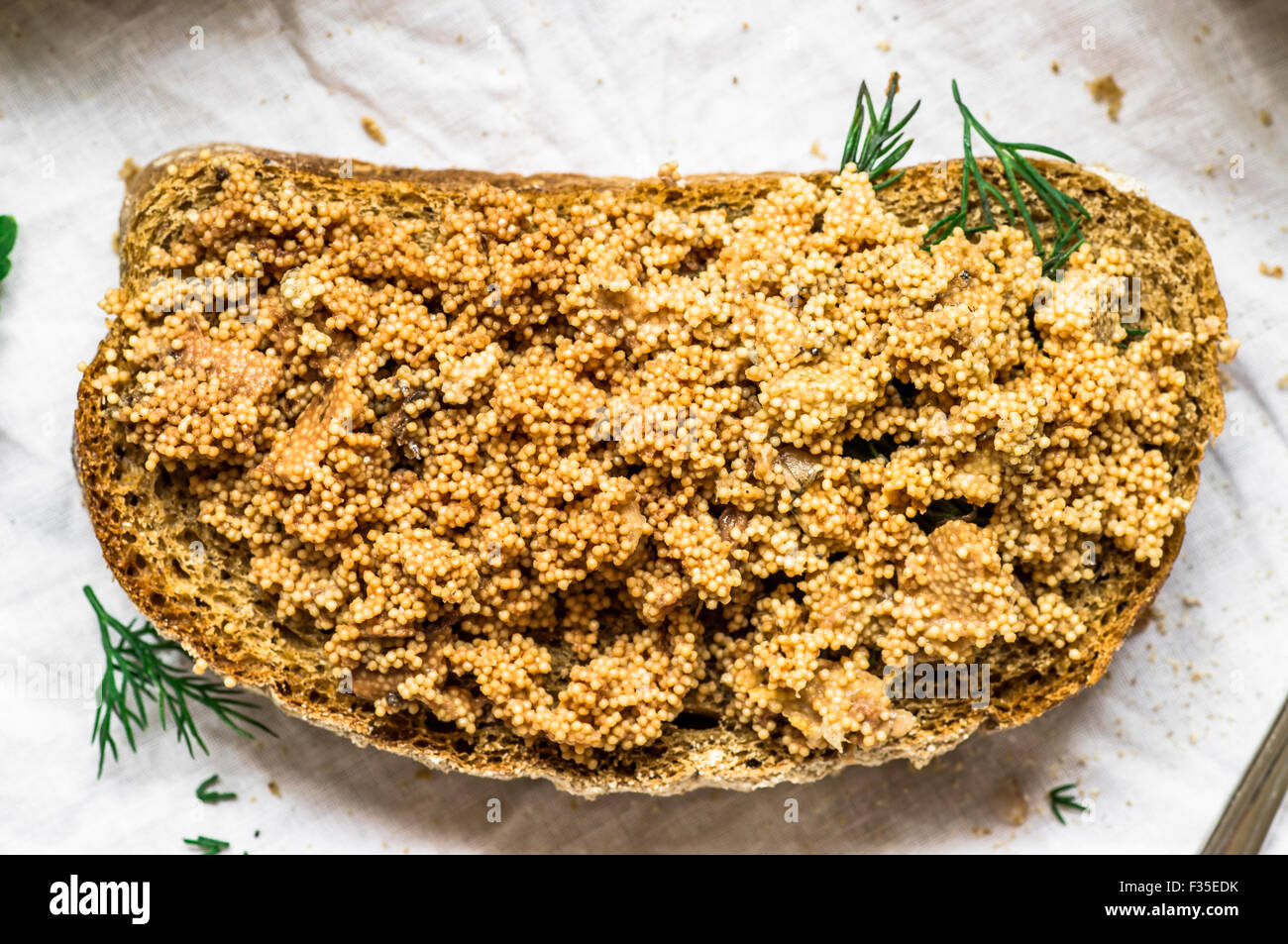 Sandwich with caviar appetizer canned marine fish Stock Photo - Alamy