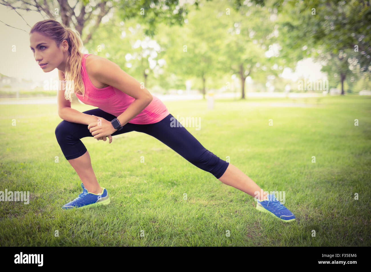 Fitness woman stretching leg hi-res stock photography and images - Alamy