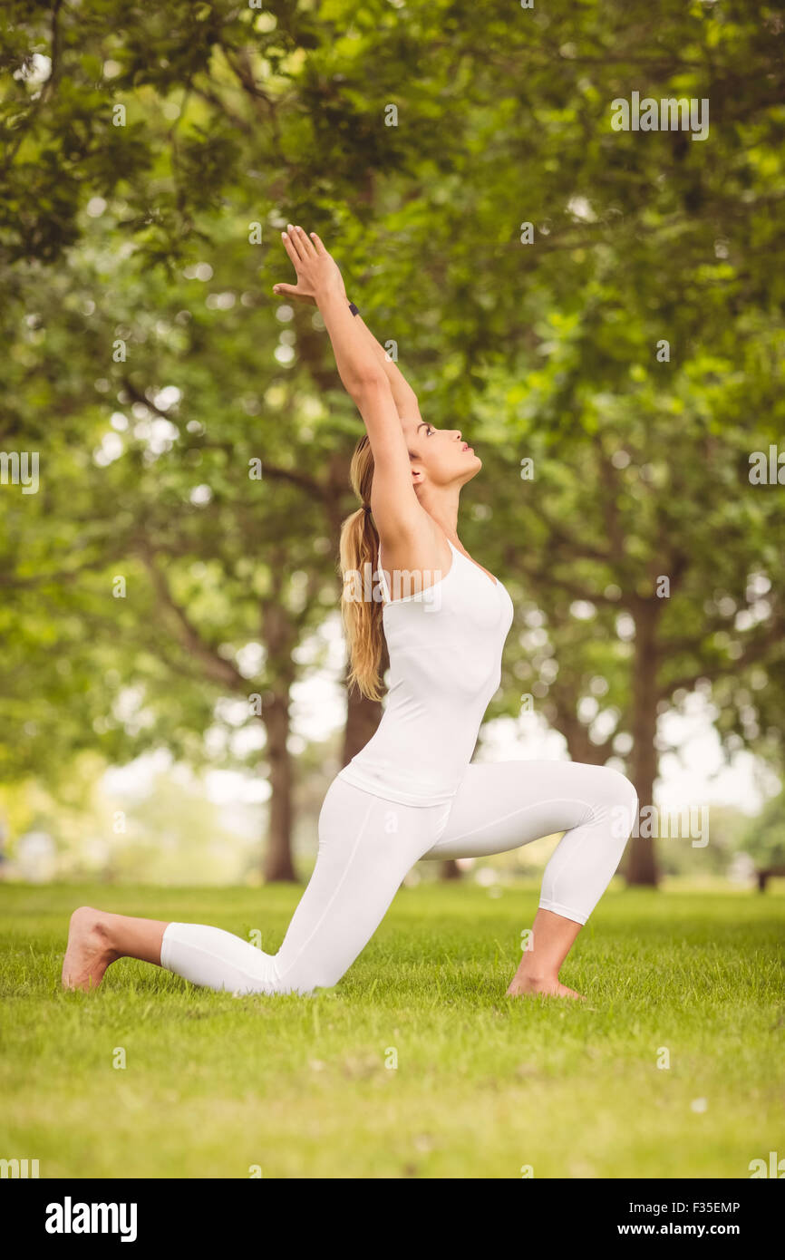 Woman stretching body with hands raised Stock Photo - Alamy
