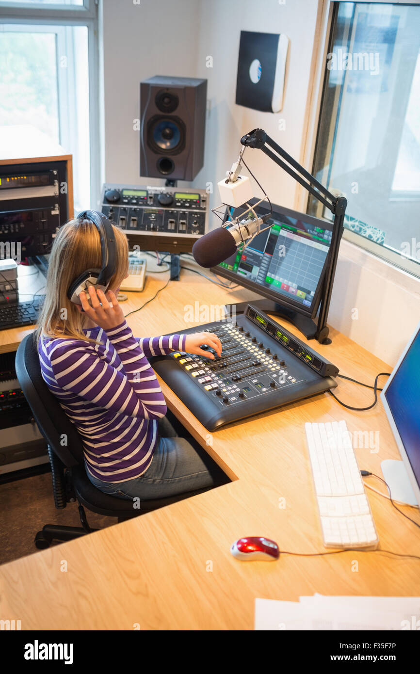 Radio host operating sound mixer hi-res stock photography and images ...