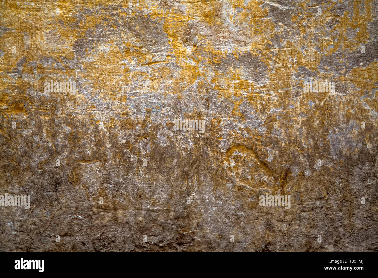 Detail of the orange stone wall Stock Photo - Alamy