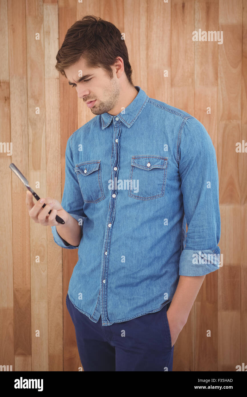 Hipster holding straight edge razor Stock Photo - Alamy