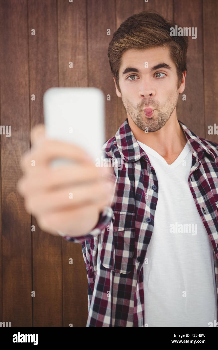 Man making face while taking selfie Stock Photo - Alamy