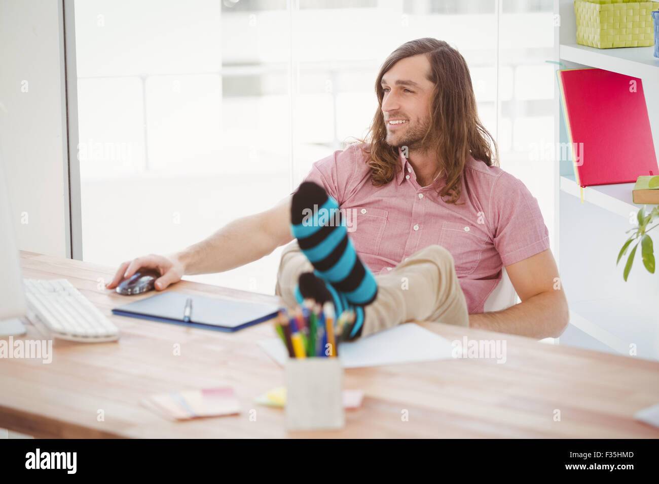 Legs up on desk hi-res stock photography and images - Alamy