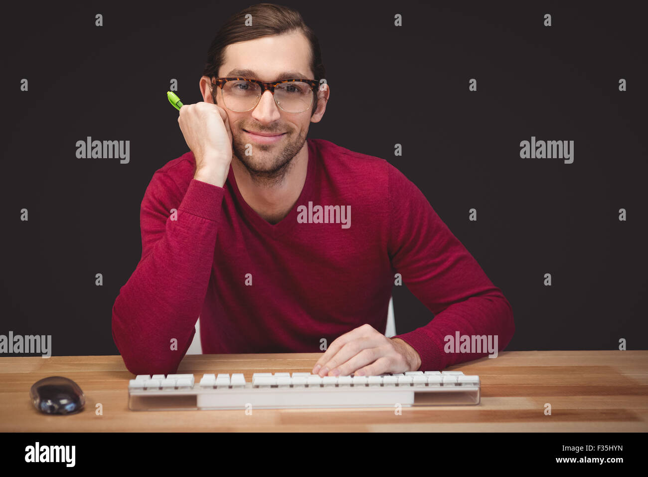 Portrait confident man sitting hi-res stock photography and images - Alamy