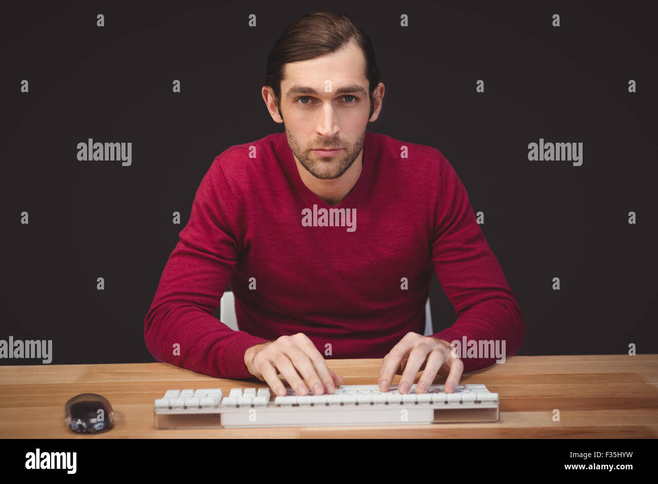 Serious typing hi-res stock photography and images - Alamy