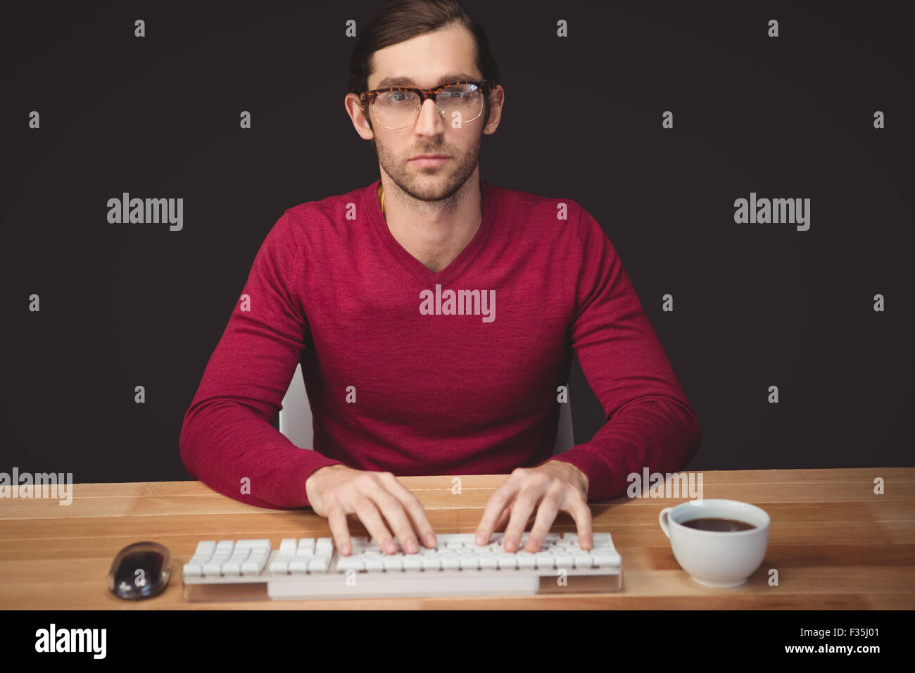Serious typing hi-res stock photography and images - Alamy