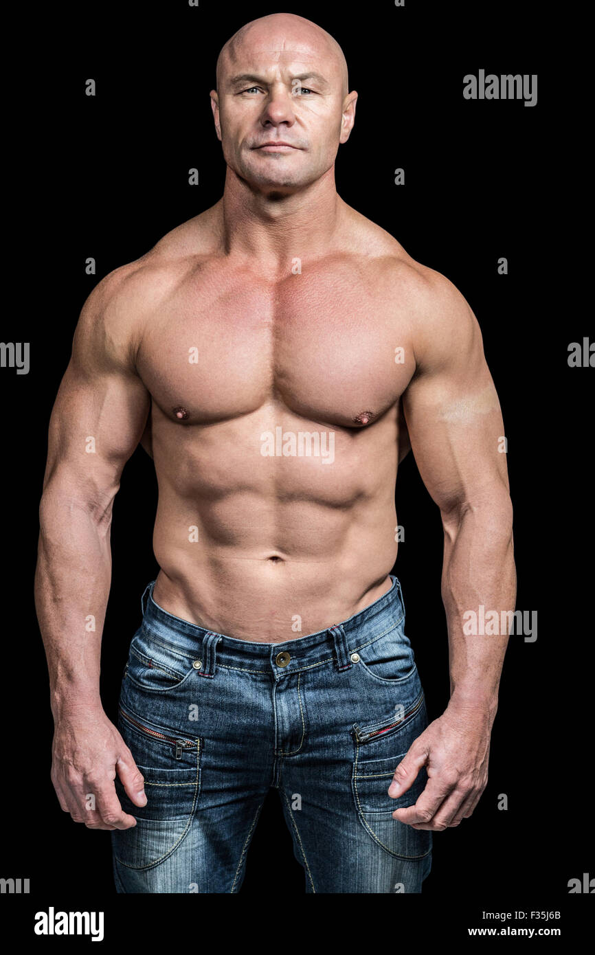 Portrait of confident bodybuilder man Stock Photo - Alamy