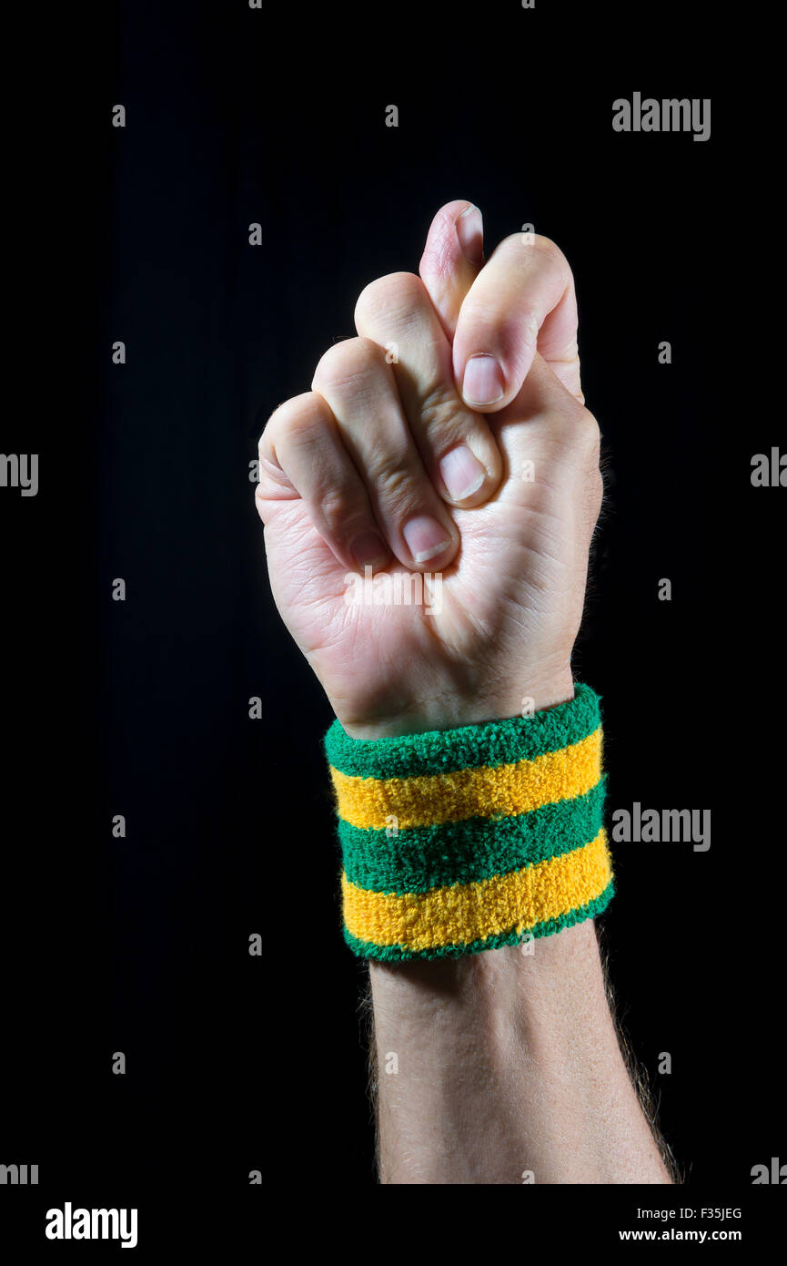 Brazilian good luck hand sign known as the figa with the thumb poking ...