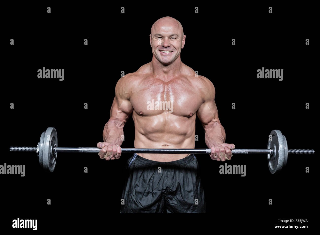 Portrait of happy muscular man lifting crossfit Stock Photo - Alamy