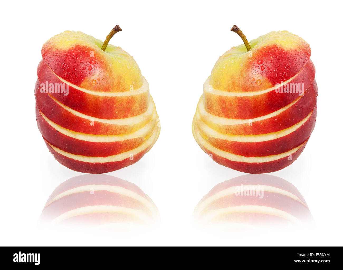 sliced apples isolated on white background Stock Photo - Alamy