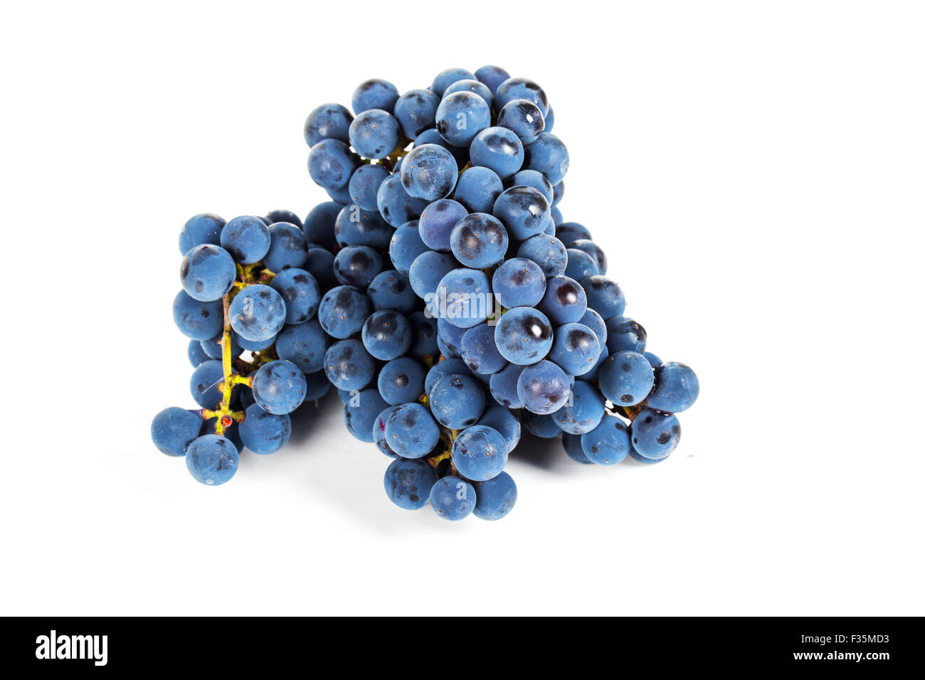 Blue grape isolated on white background Stock Photo - Alamy