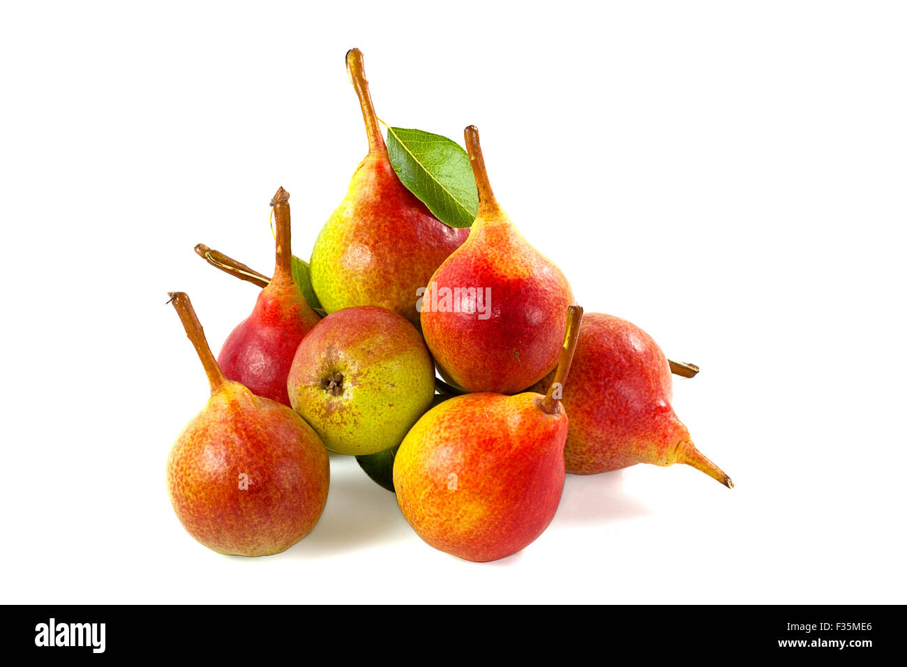 many fresh pears isolated on white background Stock Photo - Alamy