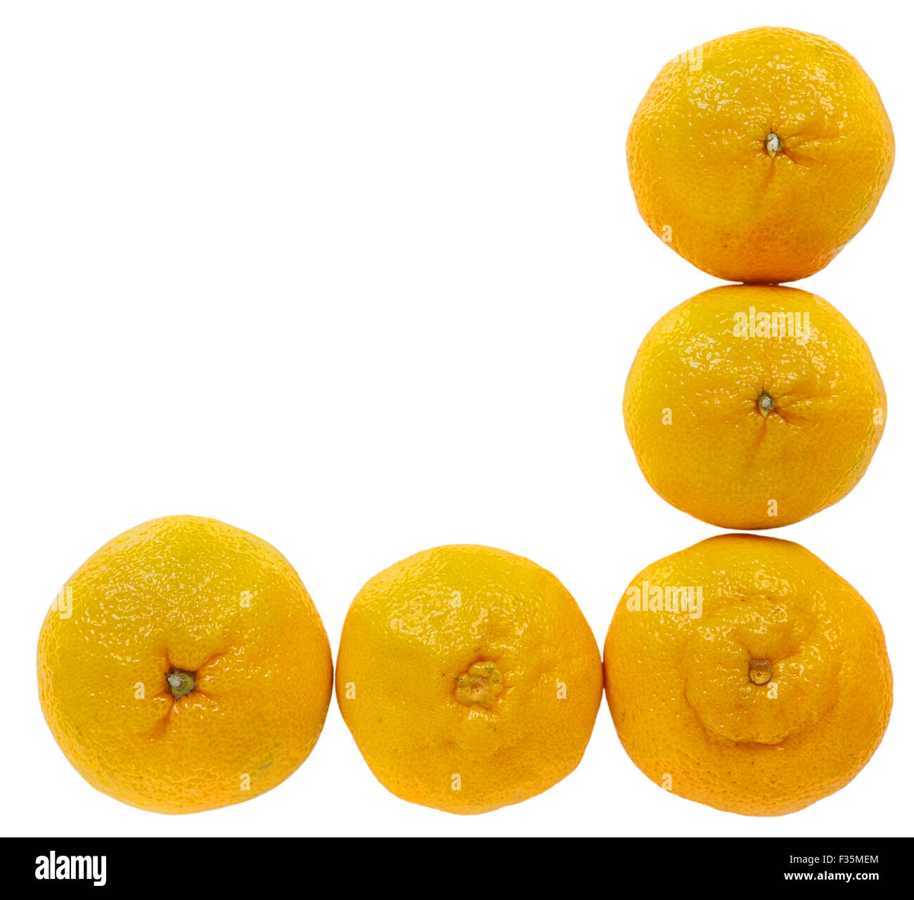 Corner of yellow mandarin isolated on white background Stock Photo - Alamy