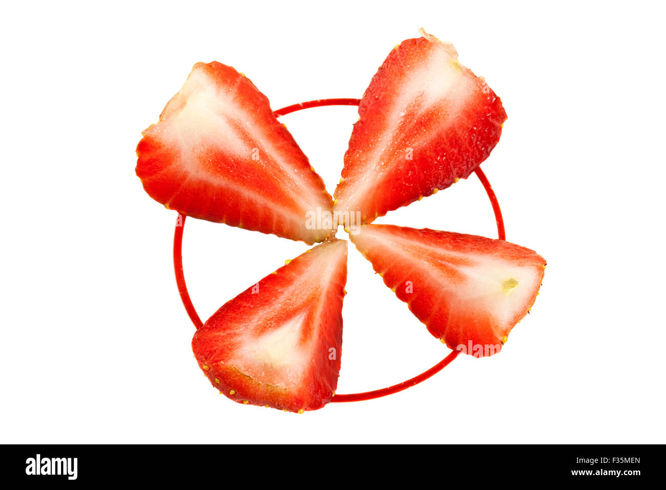 four halves of strawberry isolated on white background Stock Photo - Alamy