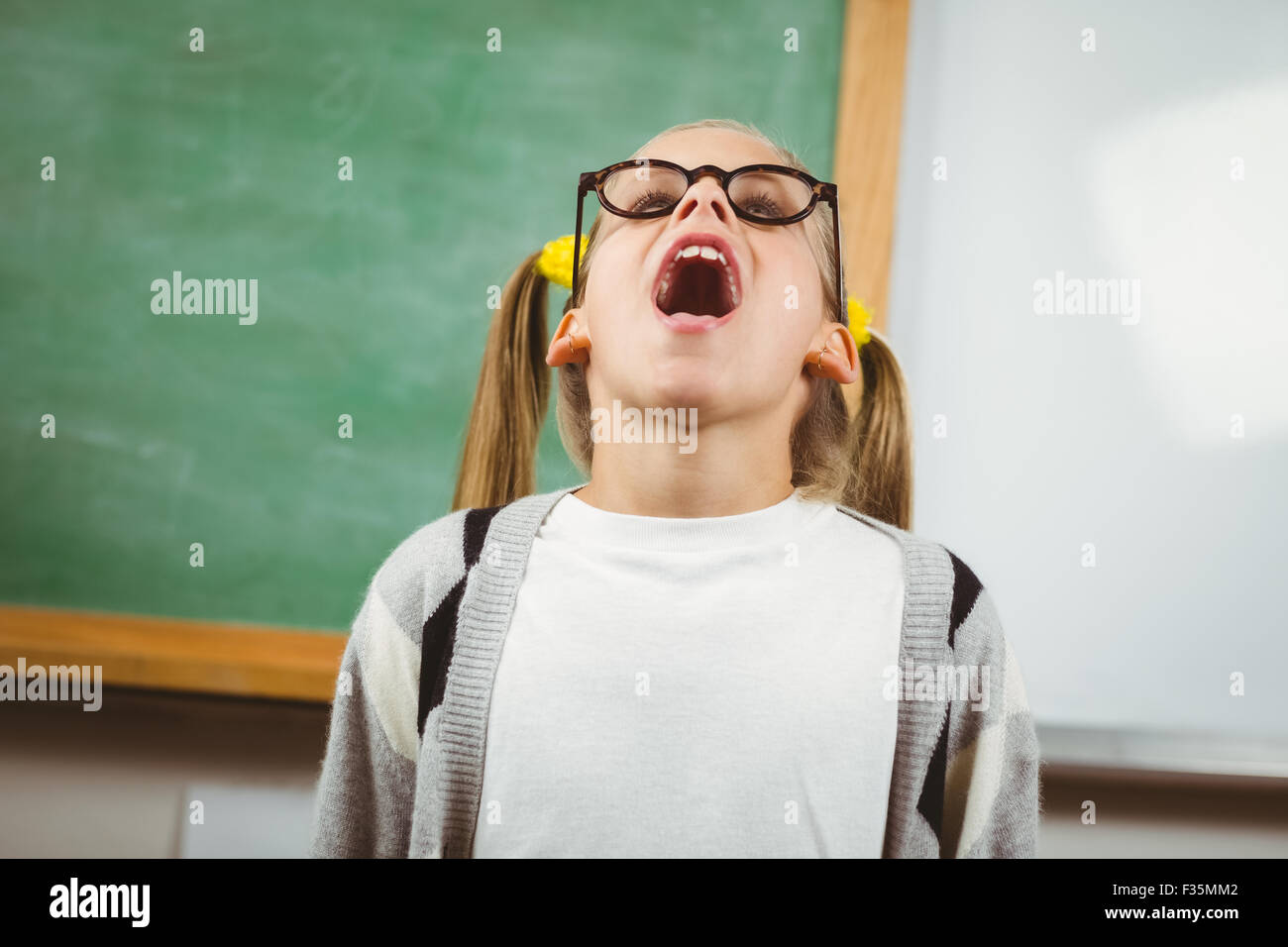 Cute pupil yelling in hi-res stock photography and images - Alamy